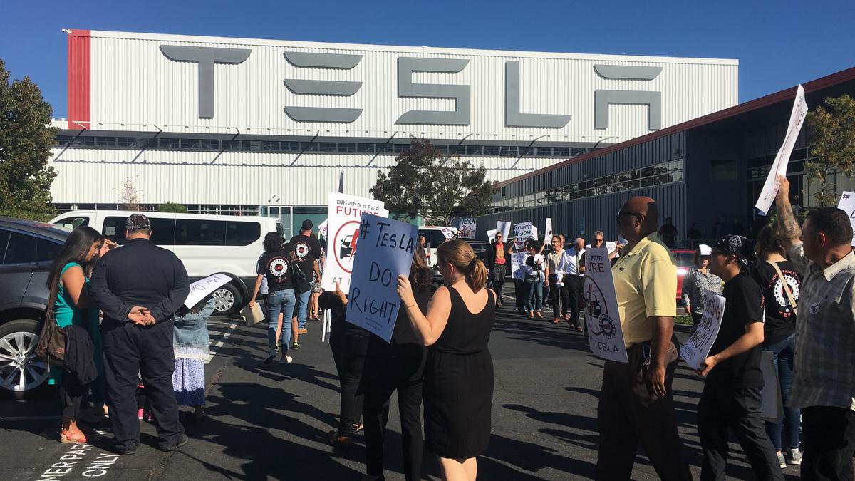 Tesla In Trouble: Lawsuit Filed by Former Employees
